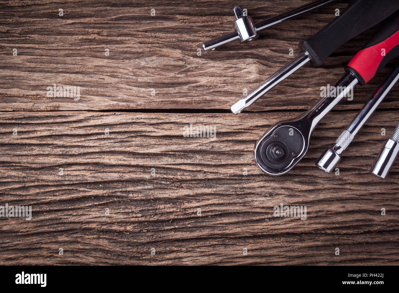 Working tools on wooden table background close up Stock Photo - Alamy
