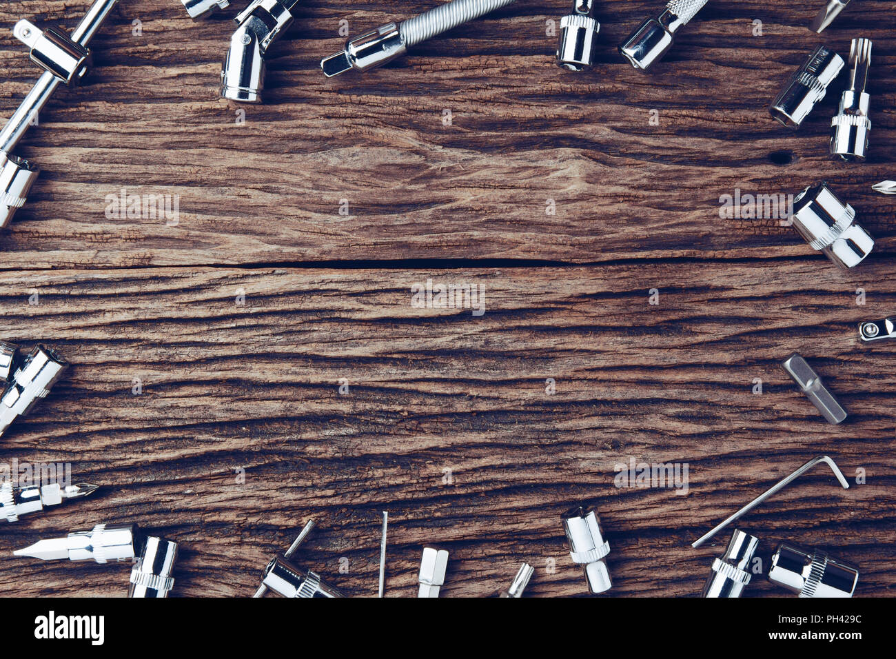 Working tools on wooden table background close up Stock Photo - Alamy