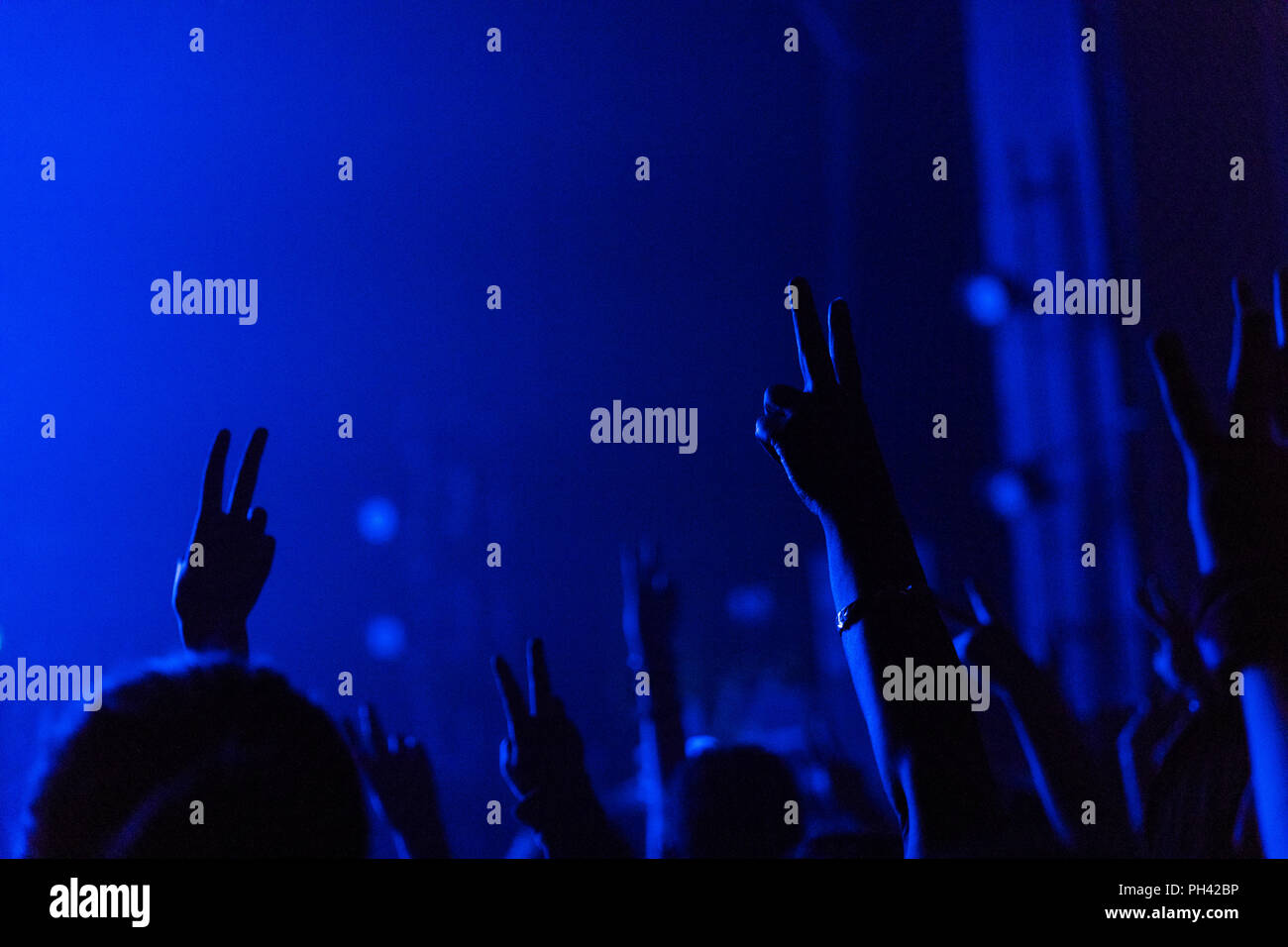 Holding hands peace hi-res stock photography and images - Alamy