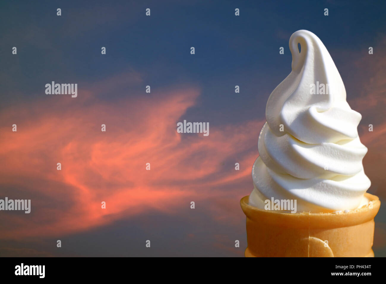 Pure White Vanilla Soft Serve Ice Cream Cone against Sunset Afterglow ...