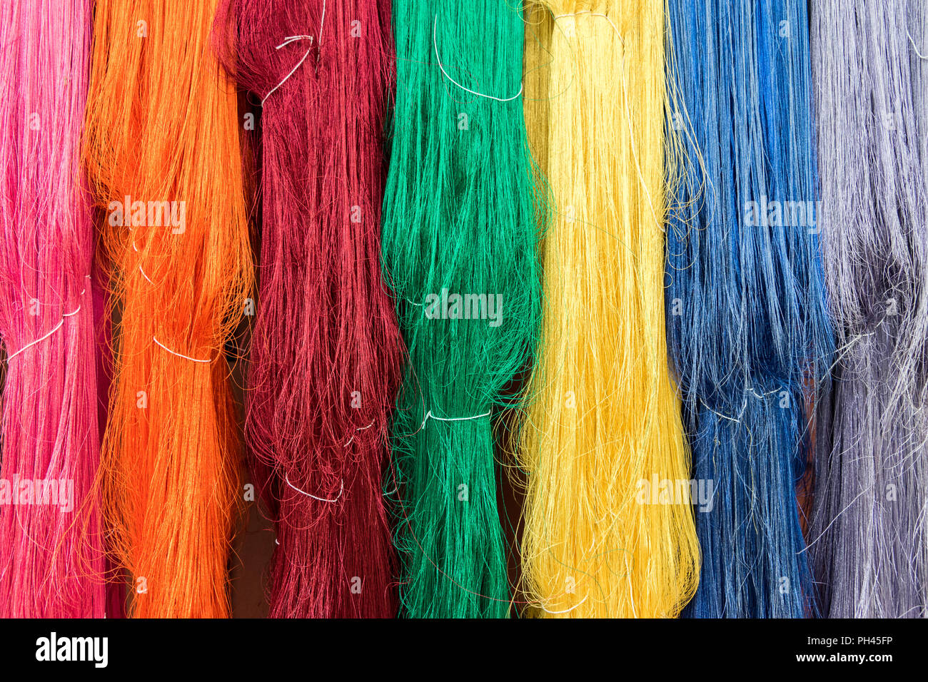 Multicolored display of finished silk thread at the Jim Thompson House ...