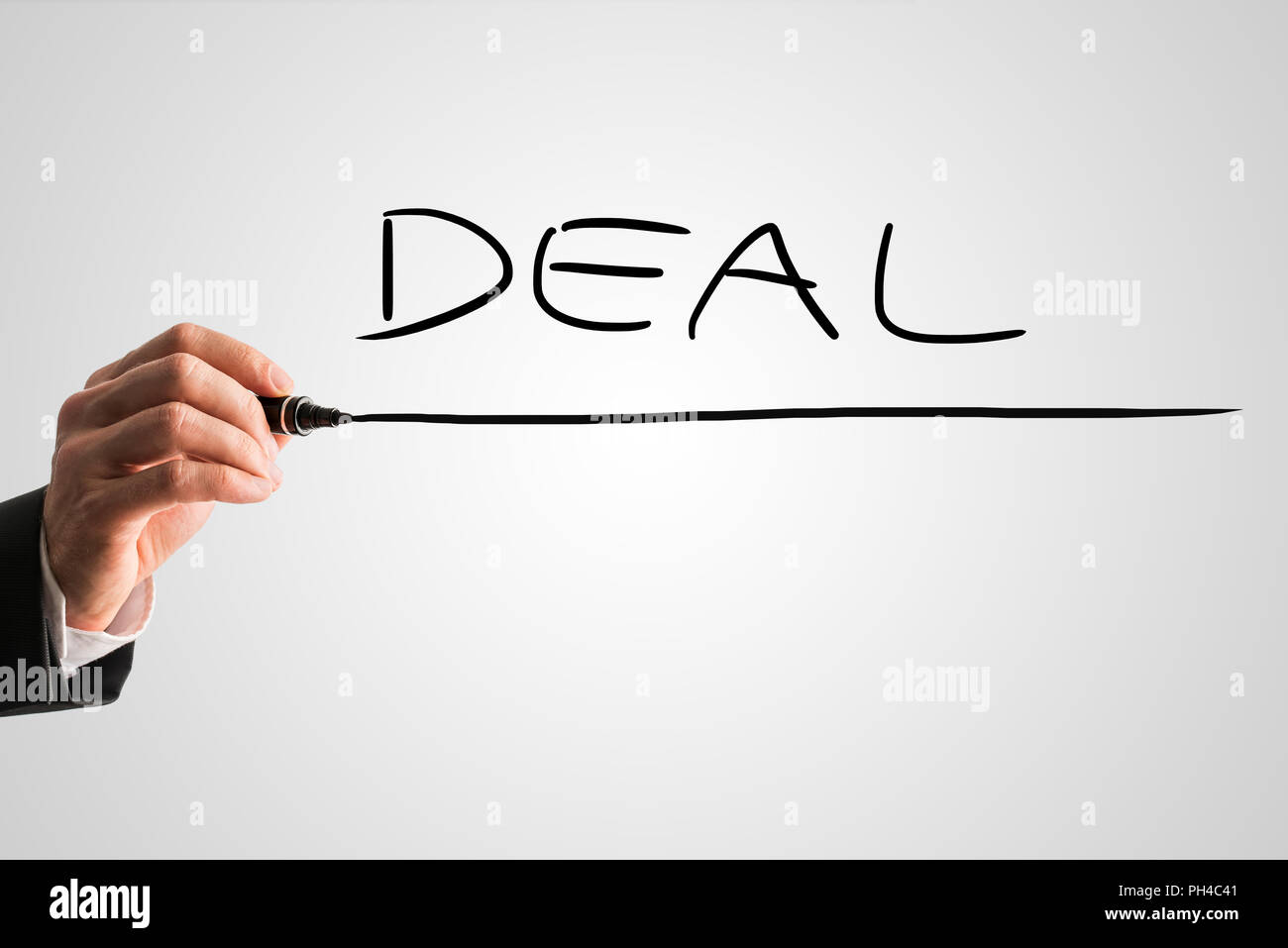 Businessman Hand Holding Marker, Writing a Conceptual Underlined Deal ...