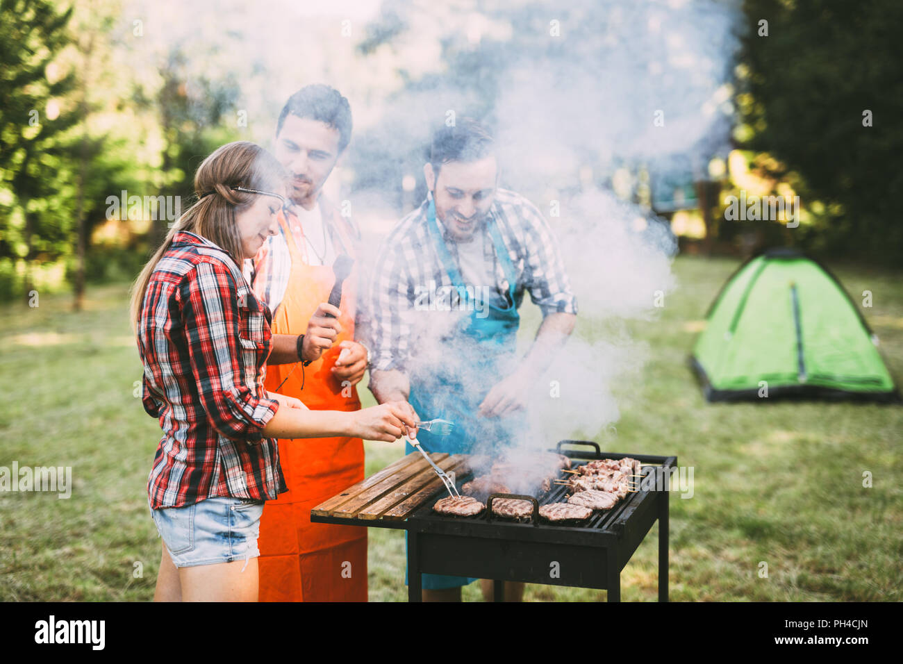 Young people in nature having fun Stock Photo - Alamy