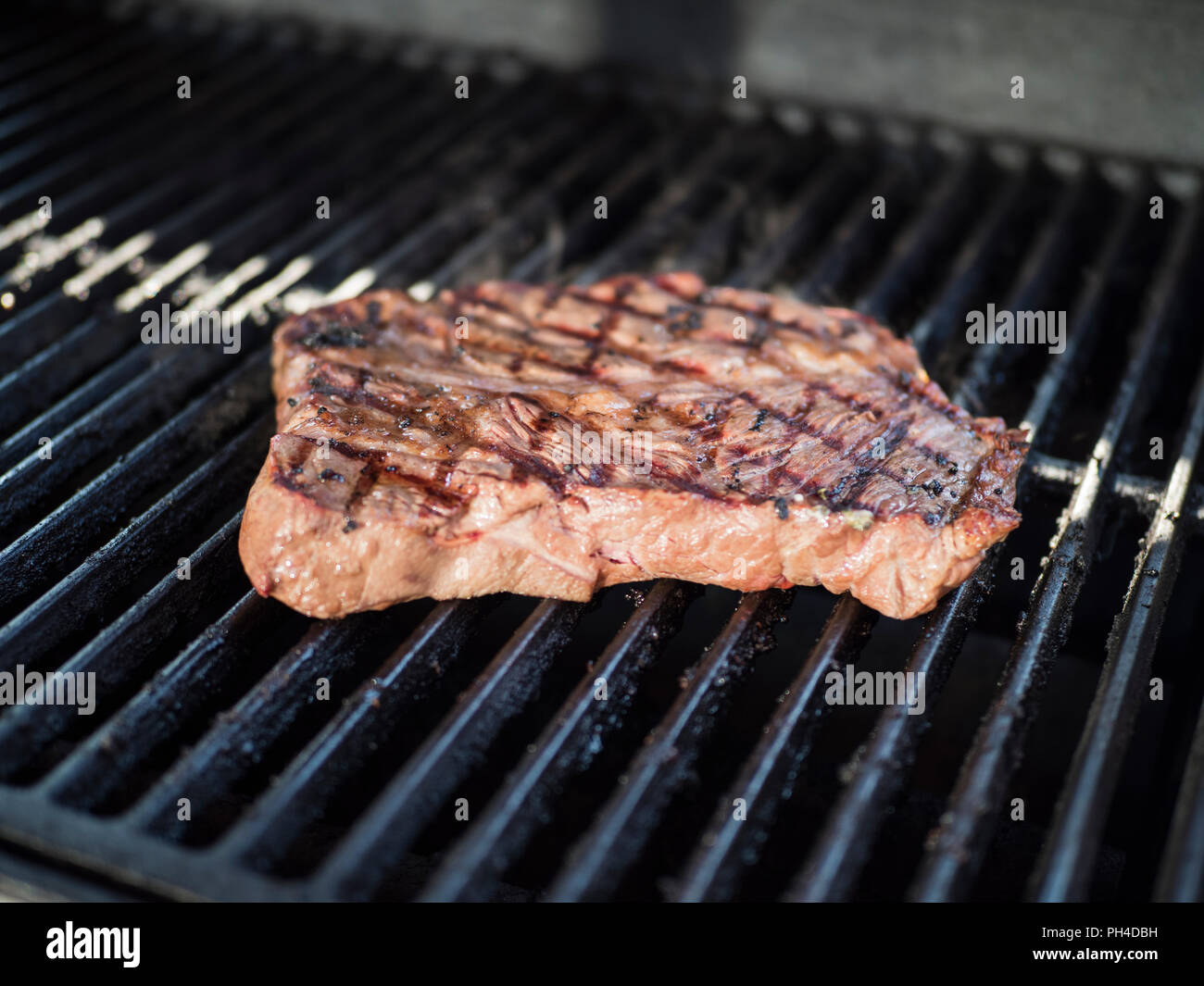 Steak on BBQ close-up food Stock Photo - Alamy