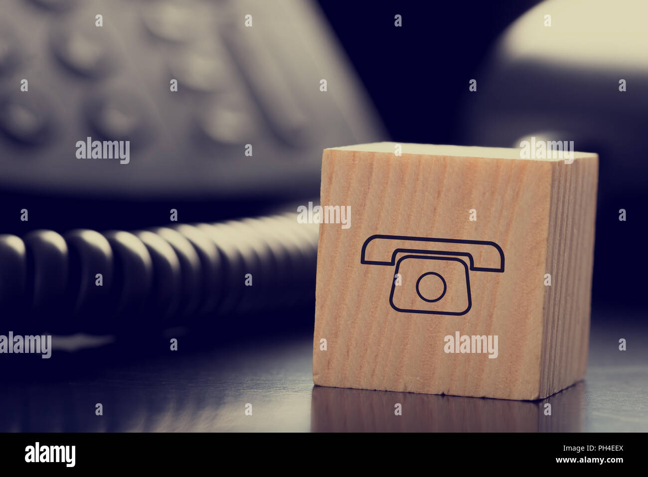 Retro Image of Wooden Block with Graphic of Old Fashioned Telephone in ...