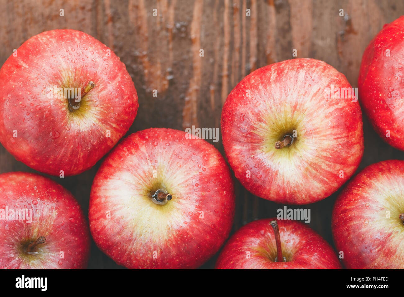 Harvest of ripe apples variety Red Delicious. Food background, top view ...