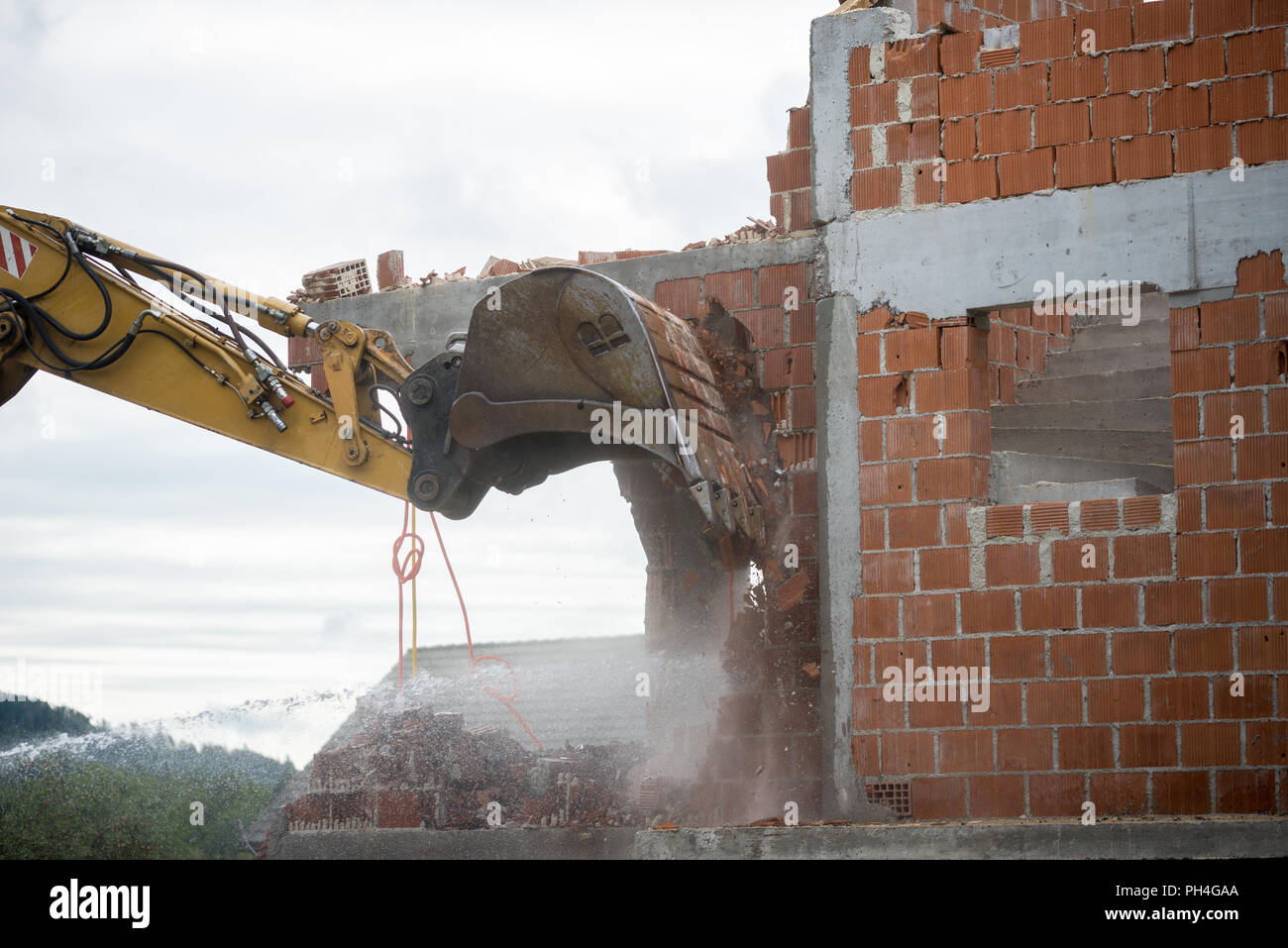 View of the hydraulic arm and bucket of a large heavy duty backhoe ...