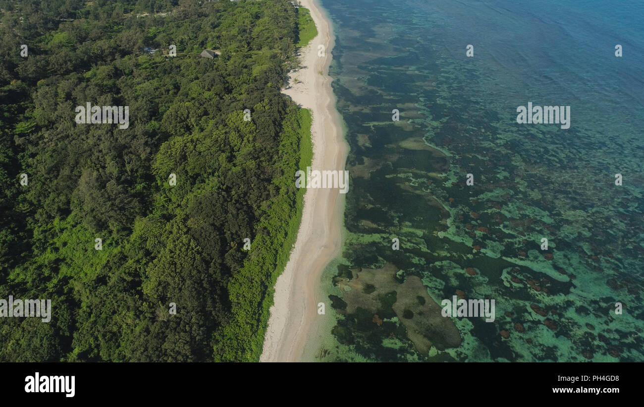 Aerial view of seashore with beach, lagoons and coral reefs ...