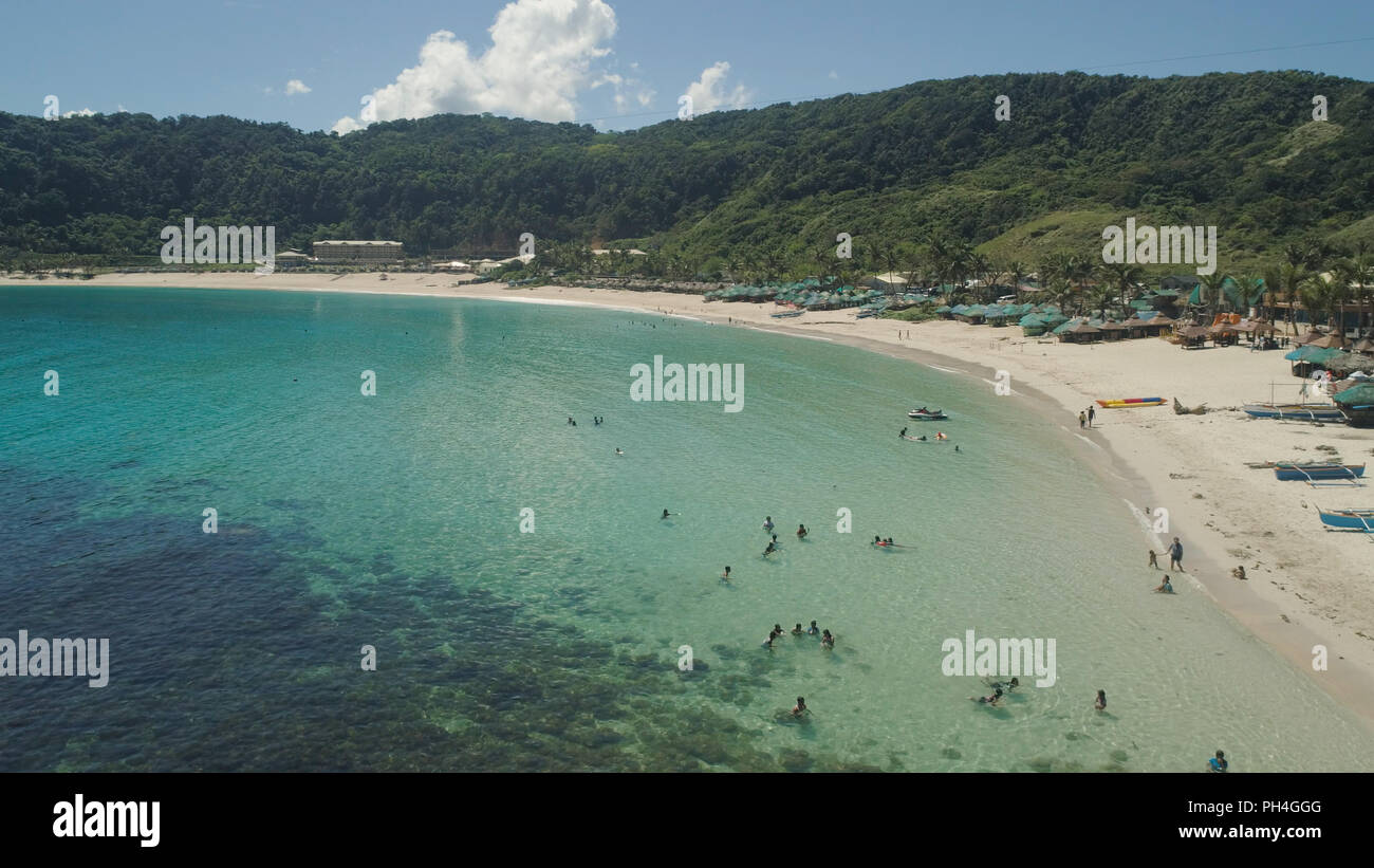 Aerial view of beautiful tropical beach with turquoise water in blue ...