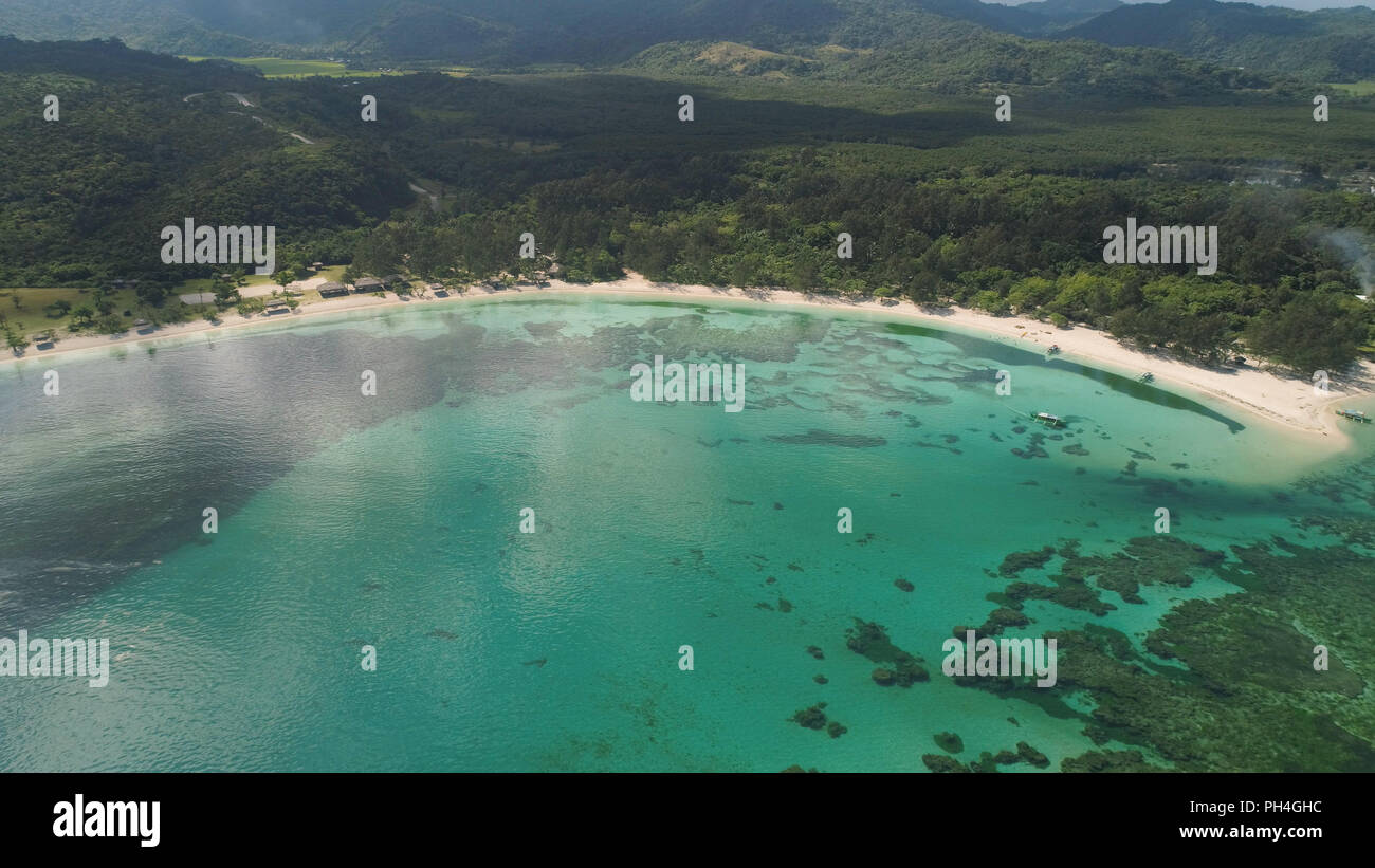Aerial view of beautiful tropical beach with turquoise water in blue ...
