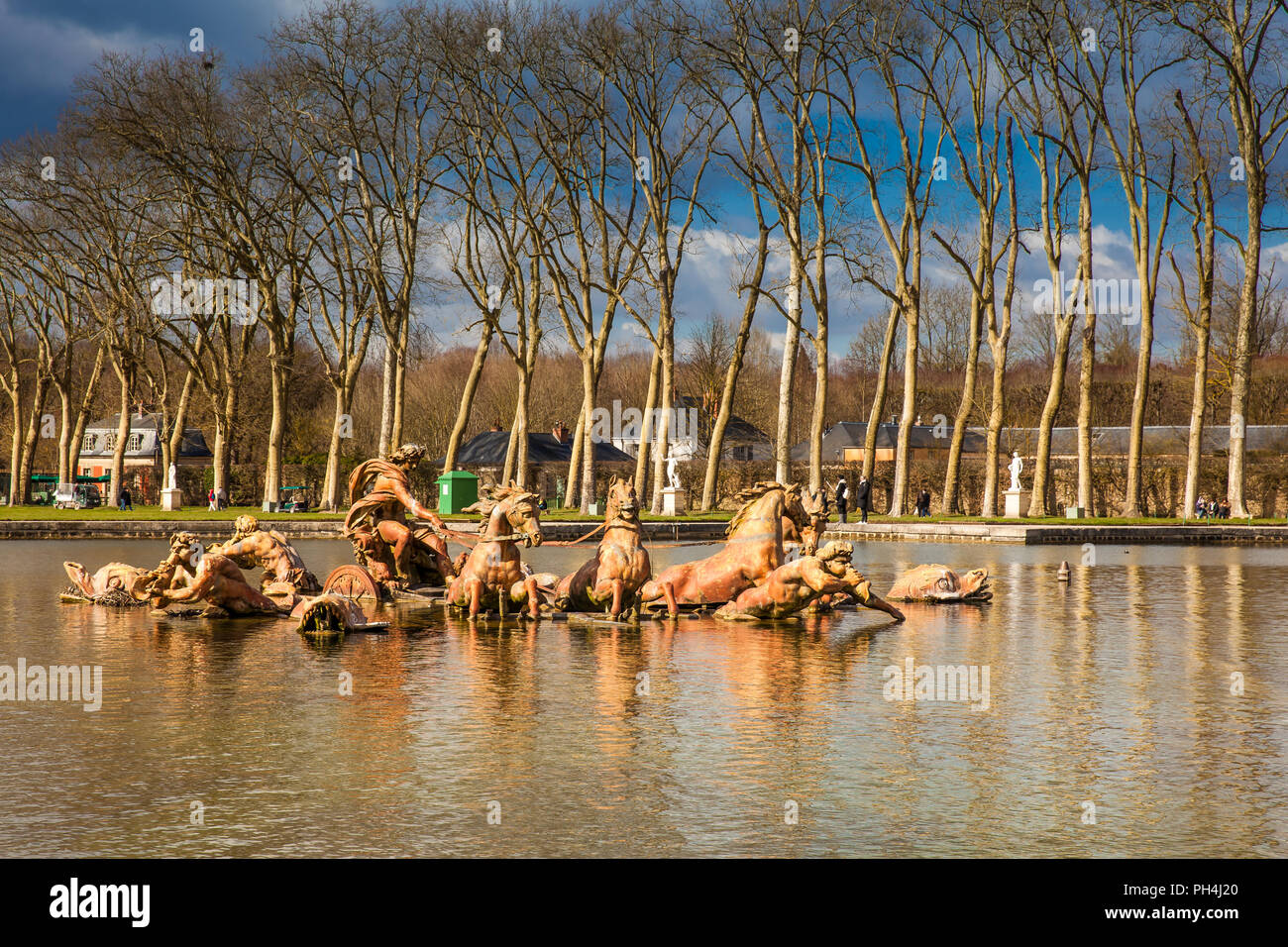 Fountain of Apollo at the garden of the Versailles Palace in a freezing ...