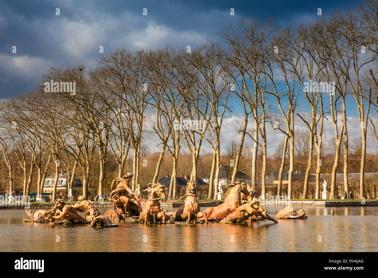 Fountain of Apollo at the garden of the Versailles Palace in a freezing ...