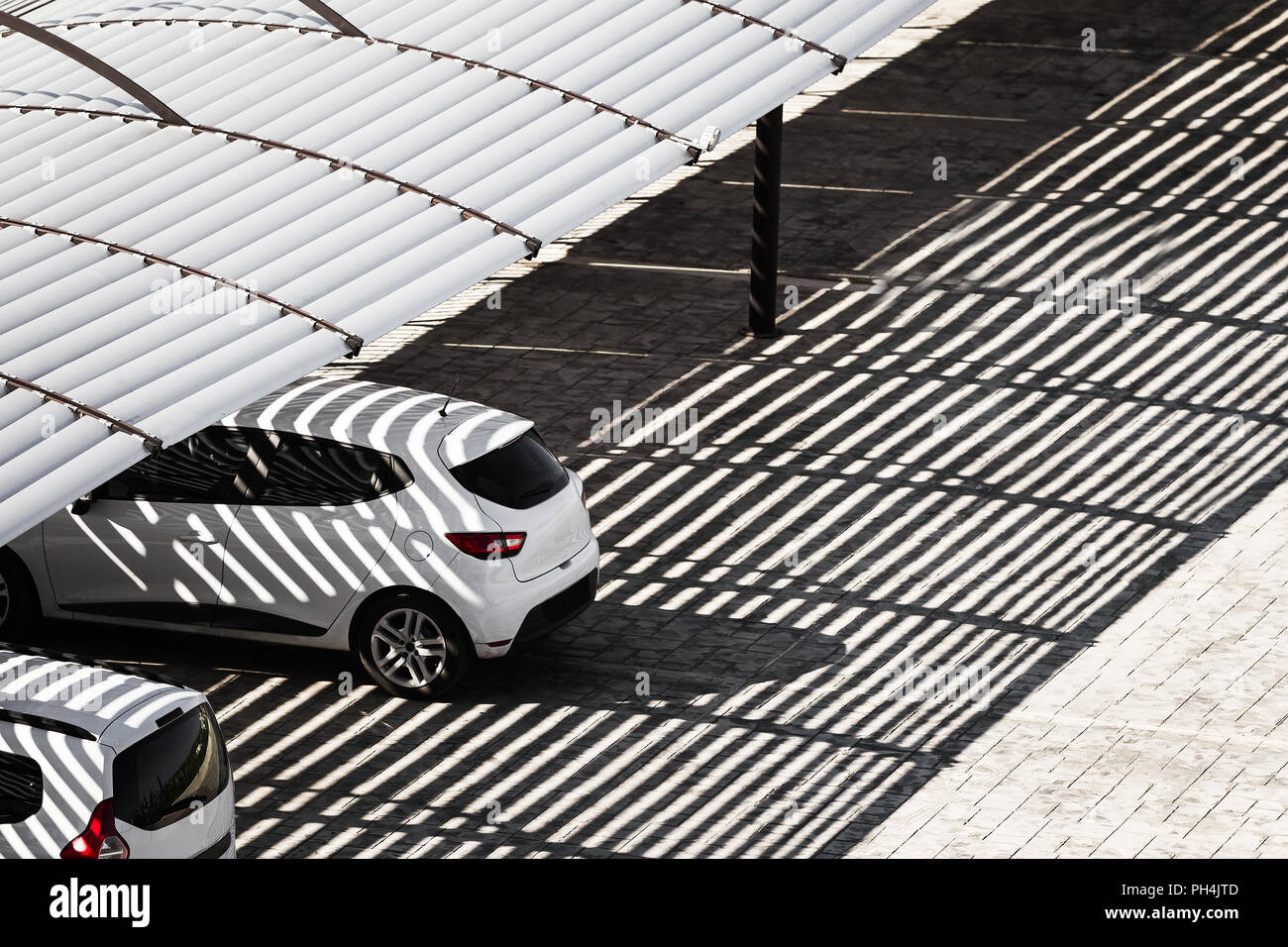 shadows falling on the cars Stock Photo - Alamy