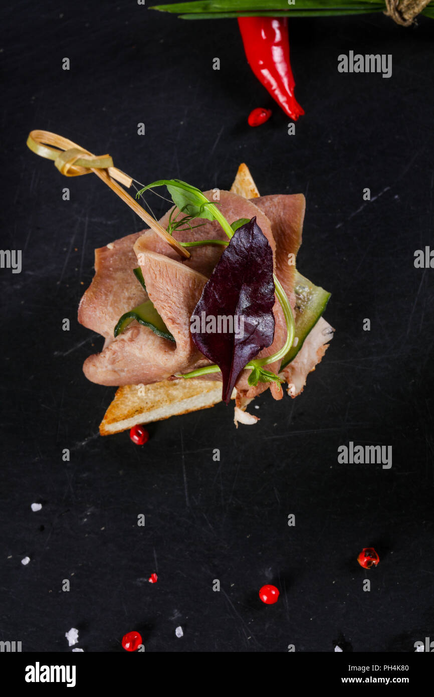 Beef canape served green onion Stock Photo - Alamy