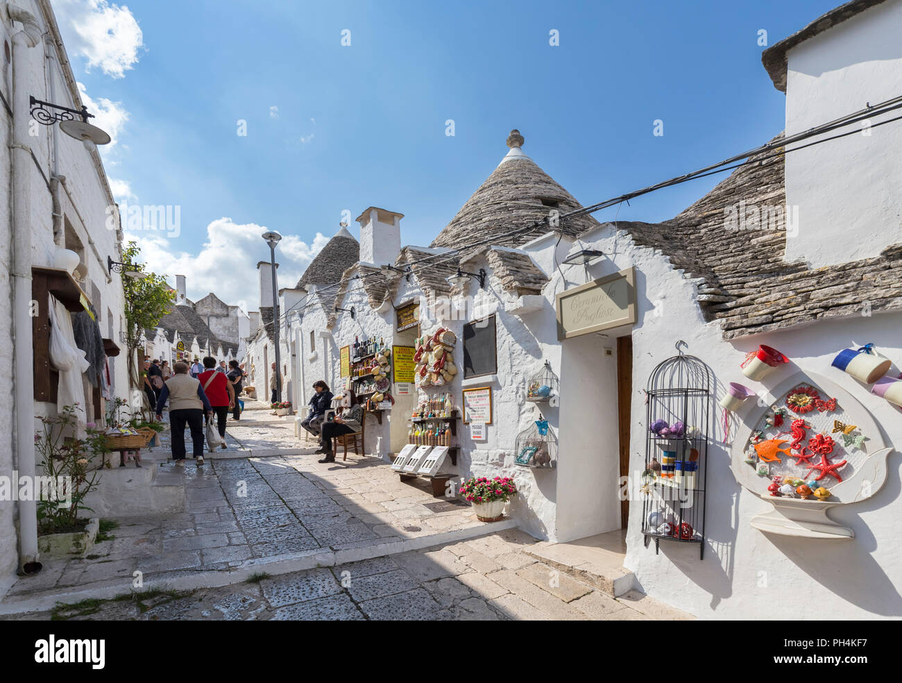 View of the typical Trulli huts and the alleys of the old village of ...