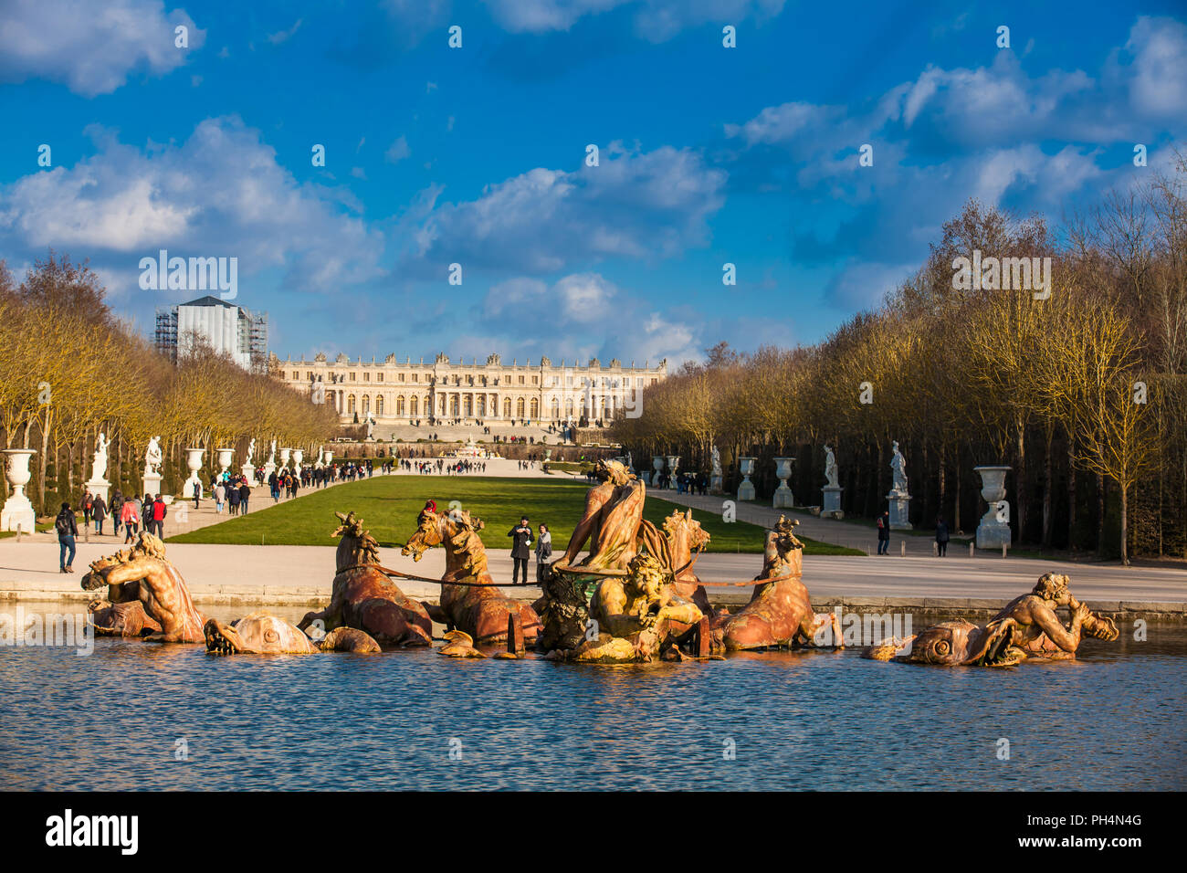 Fountain of Apollo at the garden of the Versailles Palace in a freezing ...