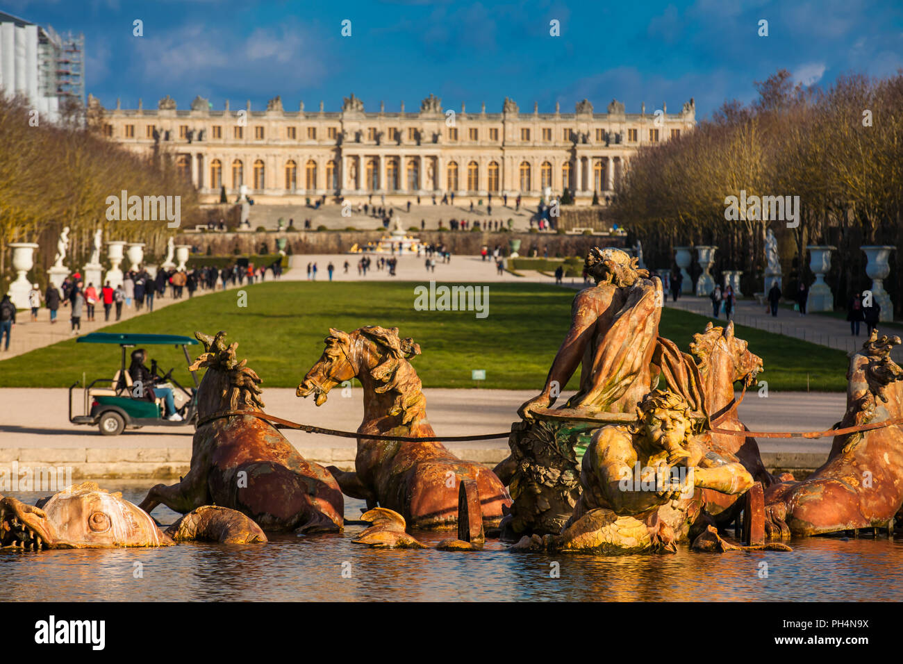 Fountain of Apollo at the garden of the Versailles Palace in a freezing ...