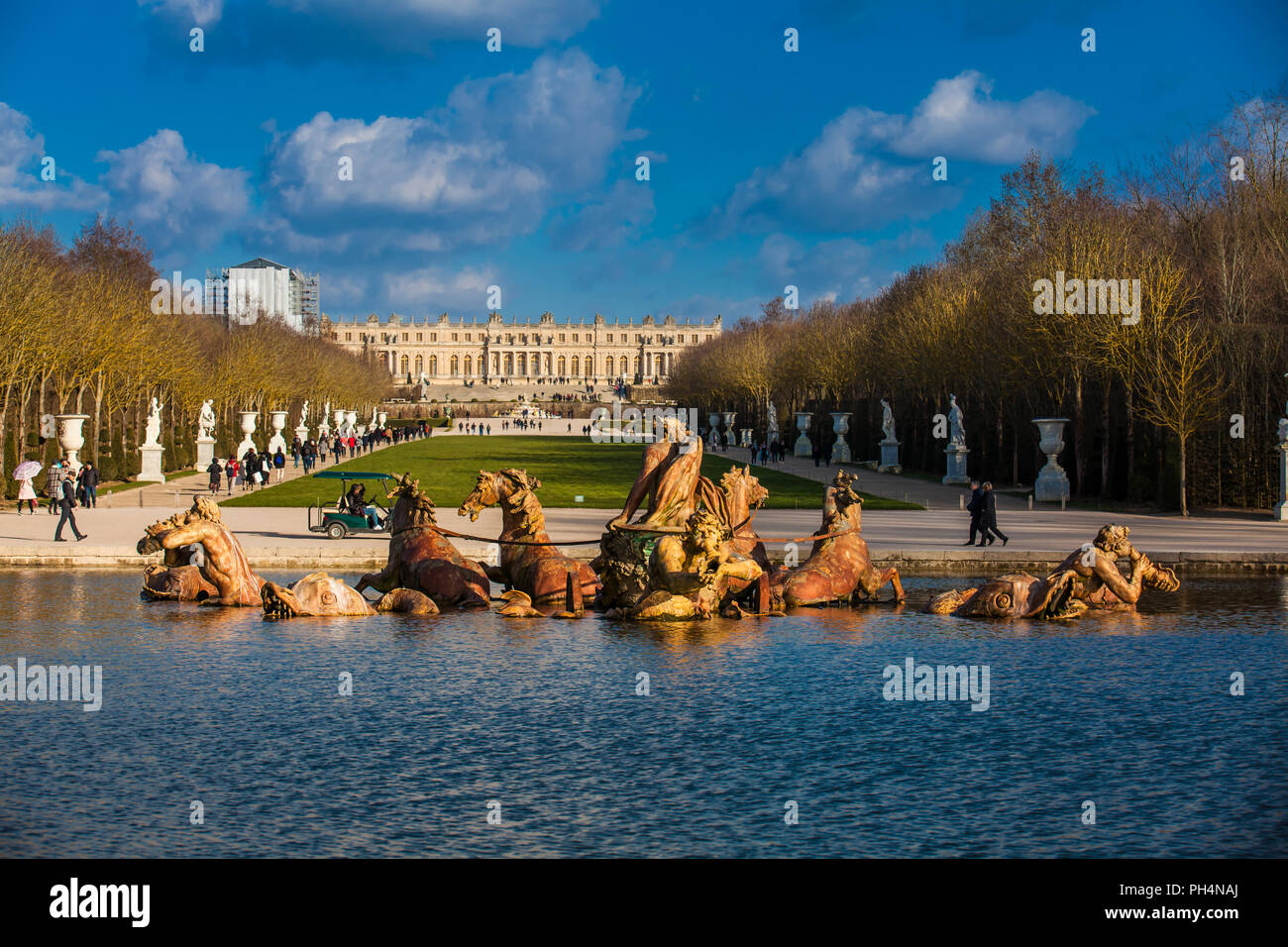 Fountain of Apollo at the garden of the Versailles Palace in a freezing ...