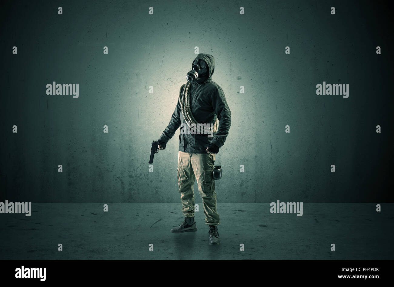 Bad agent in a dark room with arms on his hand and gas mask Stock Photo ...