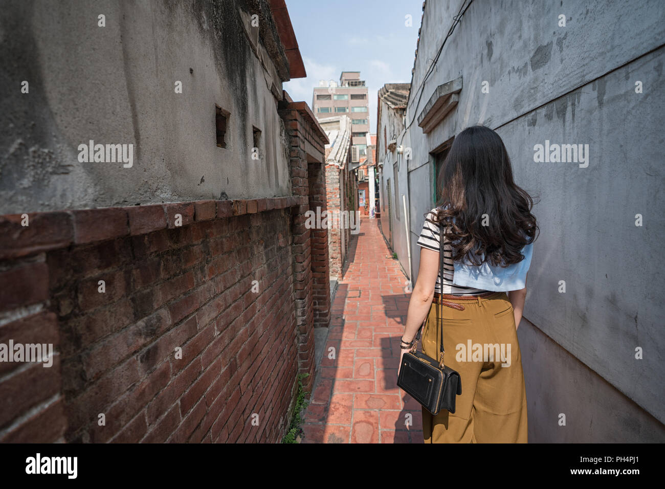Back alley people walk in hi-res stock photography and images - Alamy