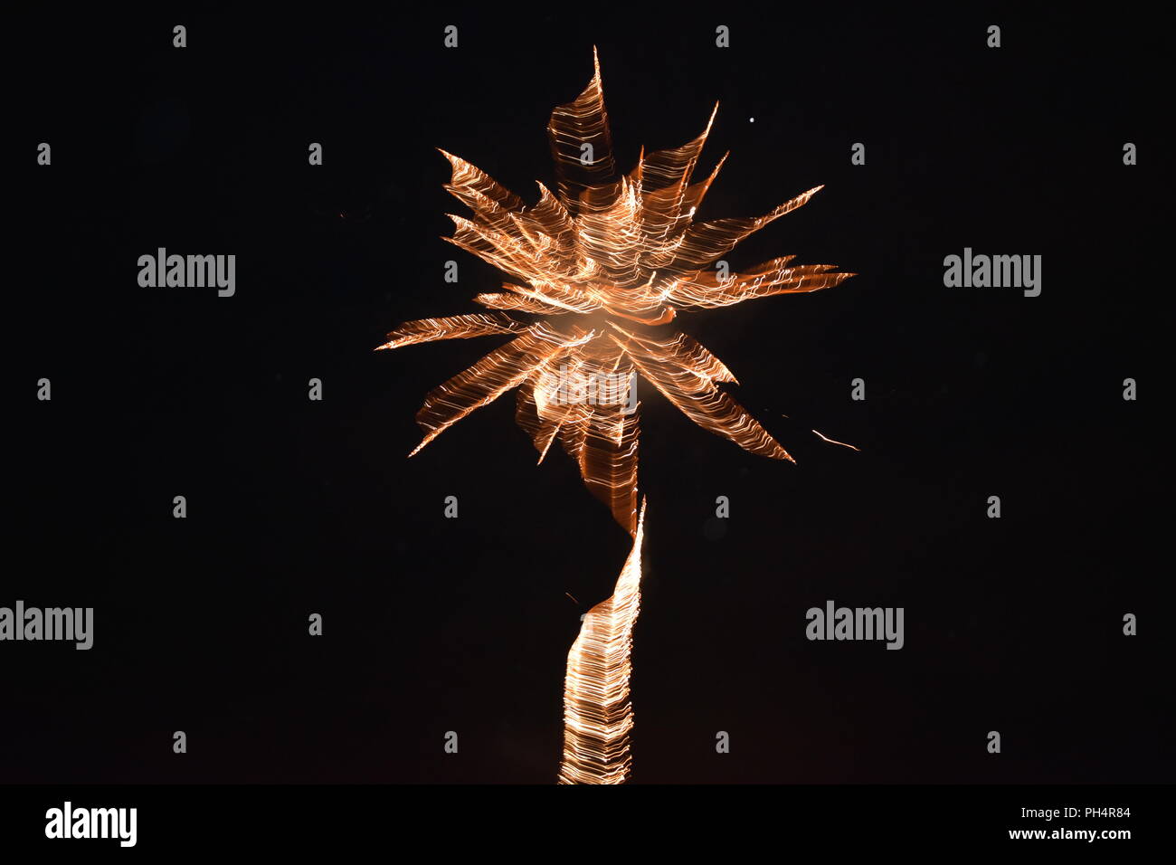 Spectacular orange fireworks on Bonfire Night Stock Photo - Alamy