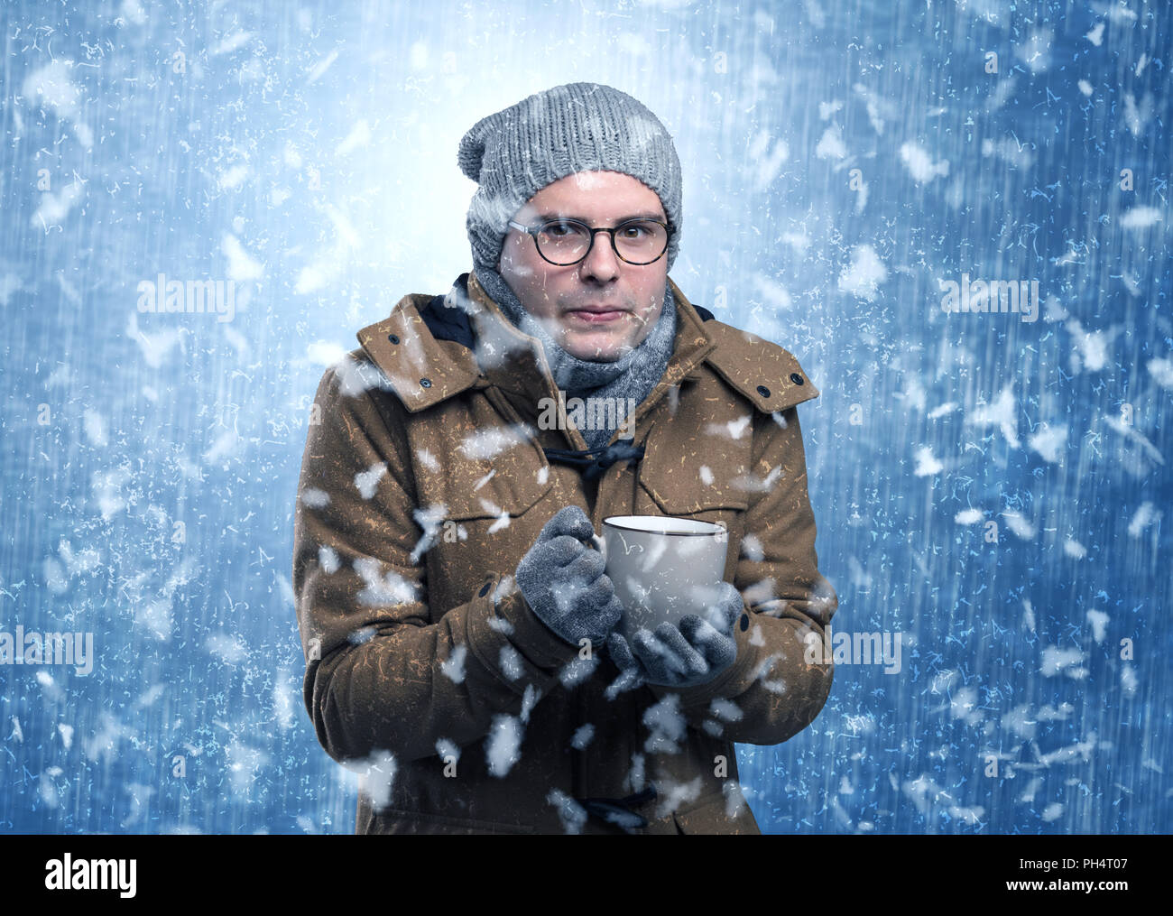 Handsome young boy shivering and trembling at snowstorm concept Stock ...