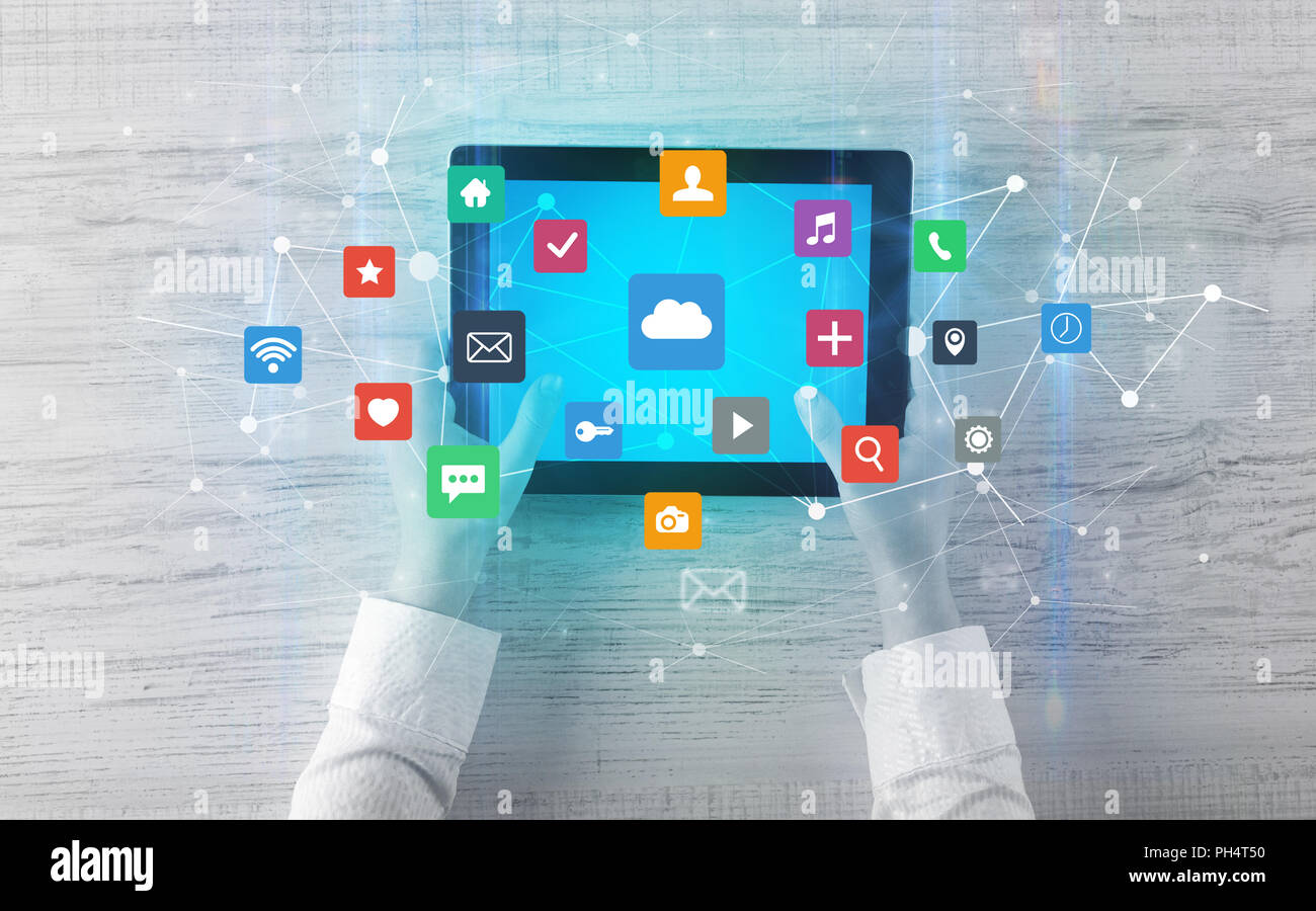 Hand touching multitask tablet with cloud wifi message social media ...
