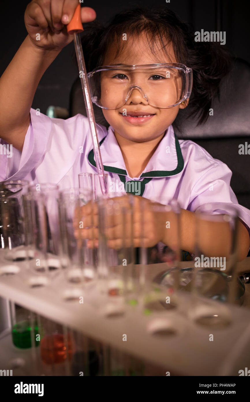 asian children in science examination laboratory Stock Photo - Alamy