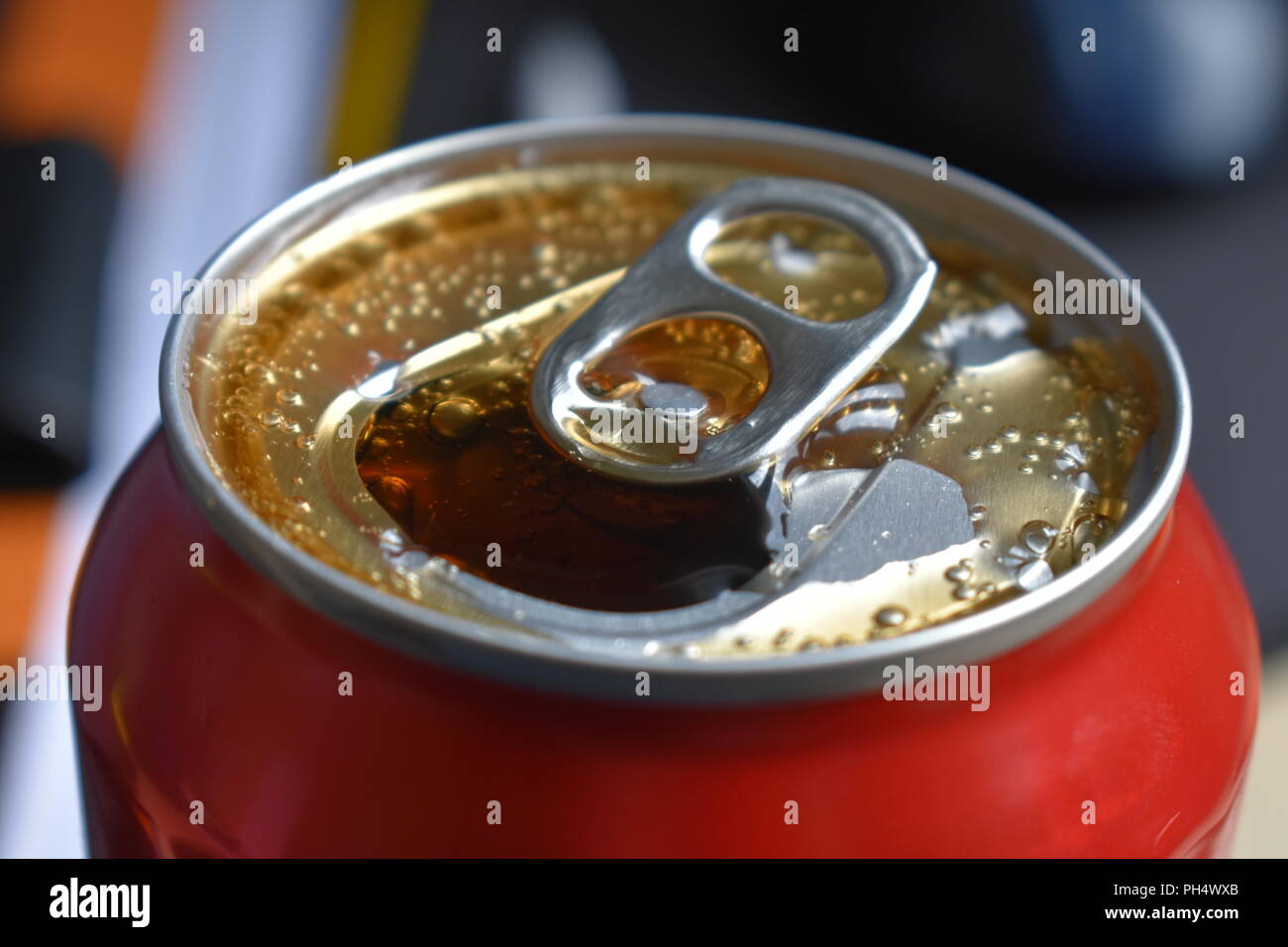 Cola can fizzing Stock Photo - Alamy