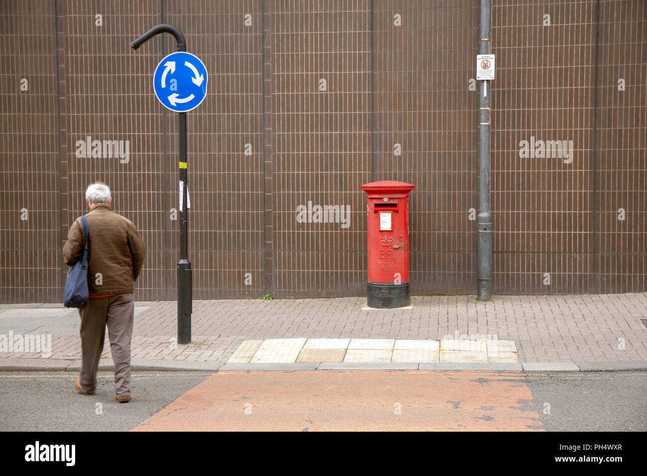 Red pillar box or letter box on a street in Sheffield, South Yorkshire ...