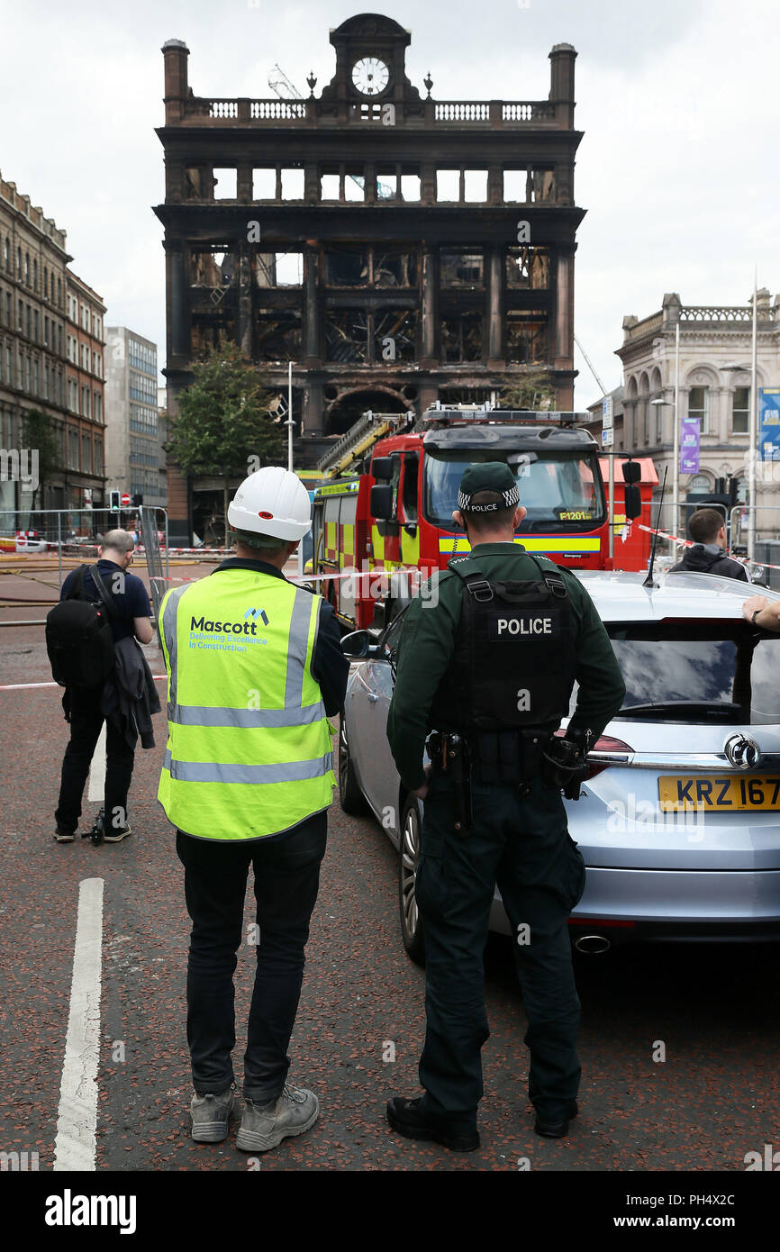 Police officer look historic five storey bank buildings hi-res stock ...