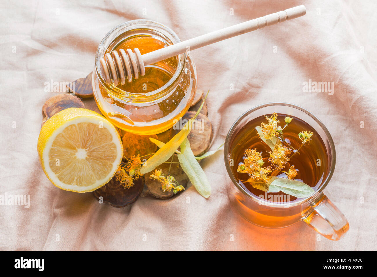 Tea with Linden, honey and Lemon. The tray on the bed, the Concept of ...