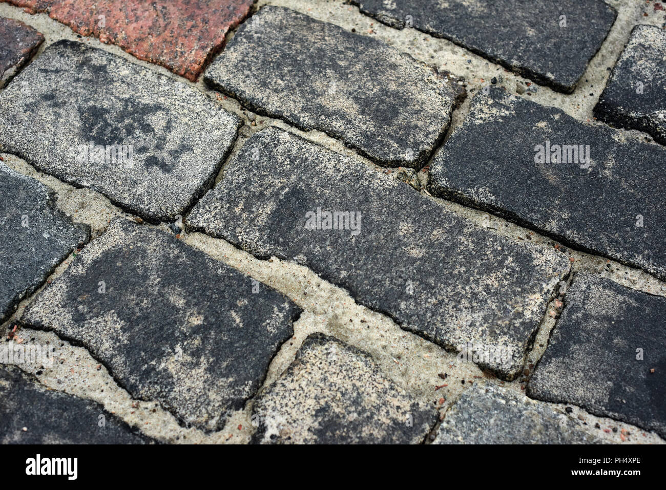 old cobblestone road for background or texture Stock Photo - Alamy