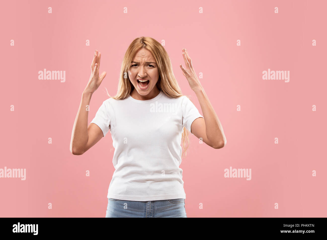 Screaming, hate, rage. Crying emotional angry woman screaming on studio ...