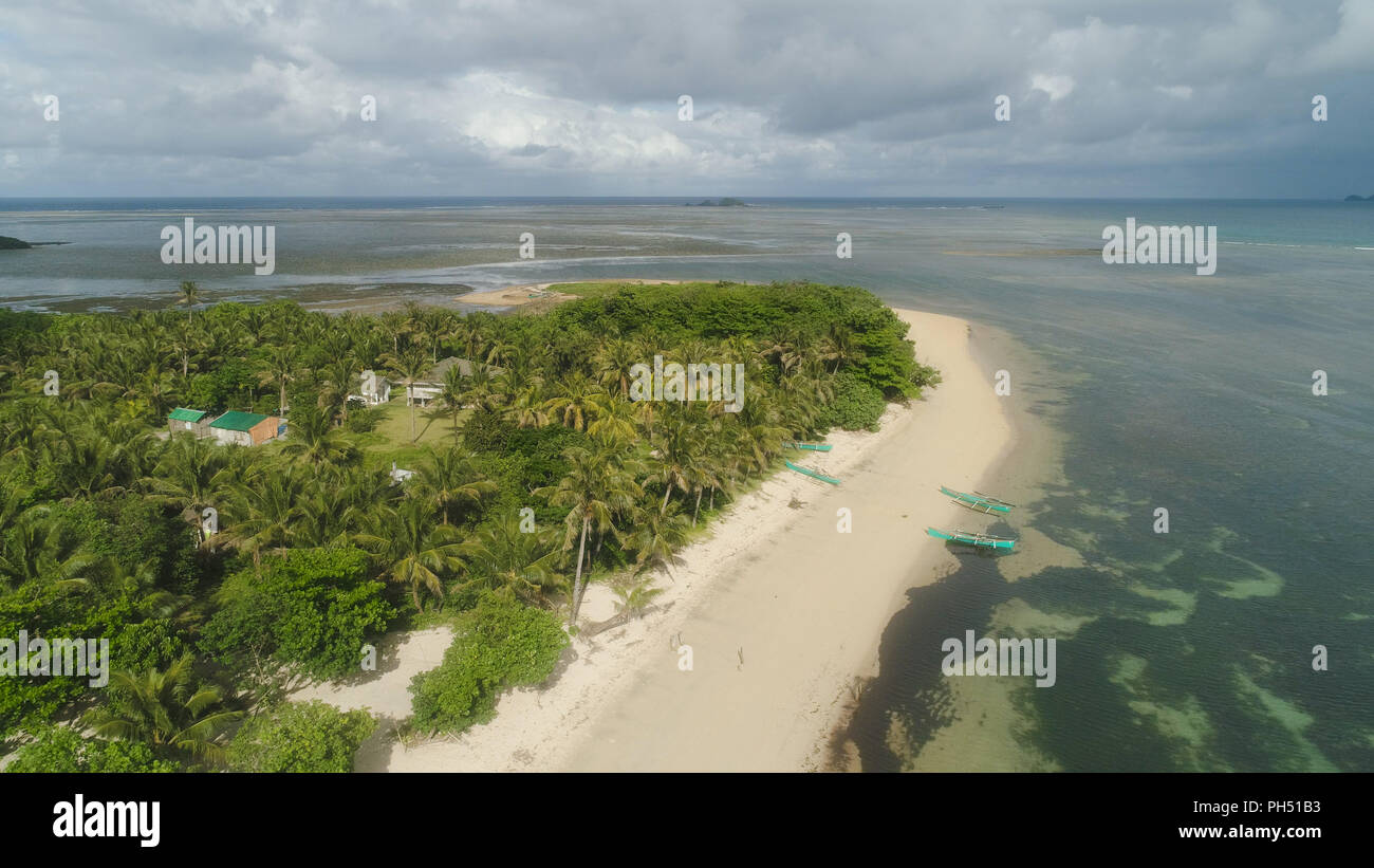 Aerial view of beautiful tropical beach with turquoise water in blue ...