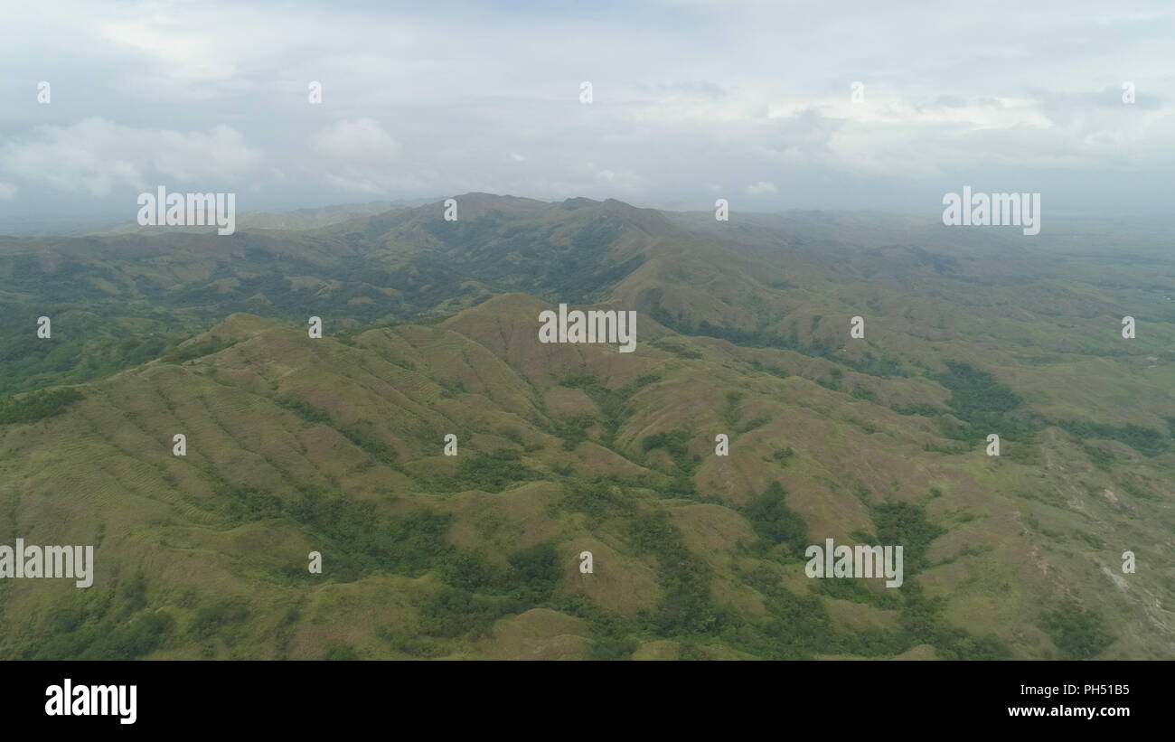Aerial view of mountains covered forest, trees. Cordillera region ...