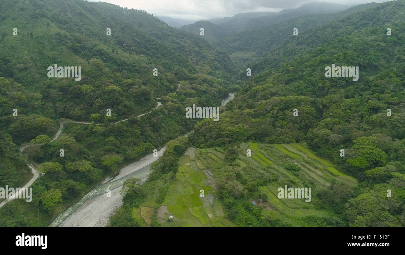 Aerial view of mountain valley in the cordillera, river, rice terraces ...