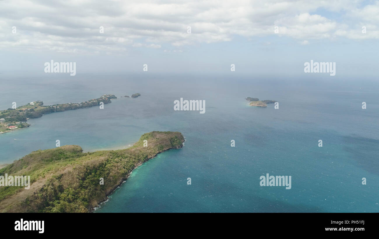 Aerial view of seashore with beach, lagoons and coral reefs ...