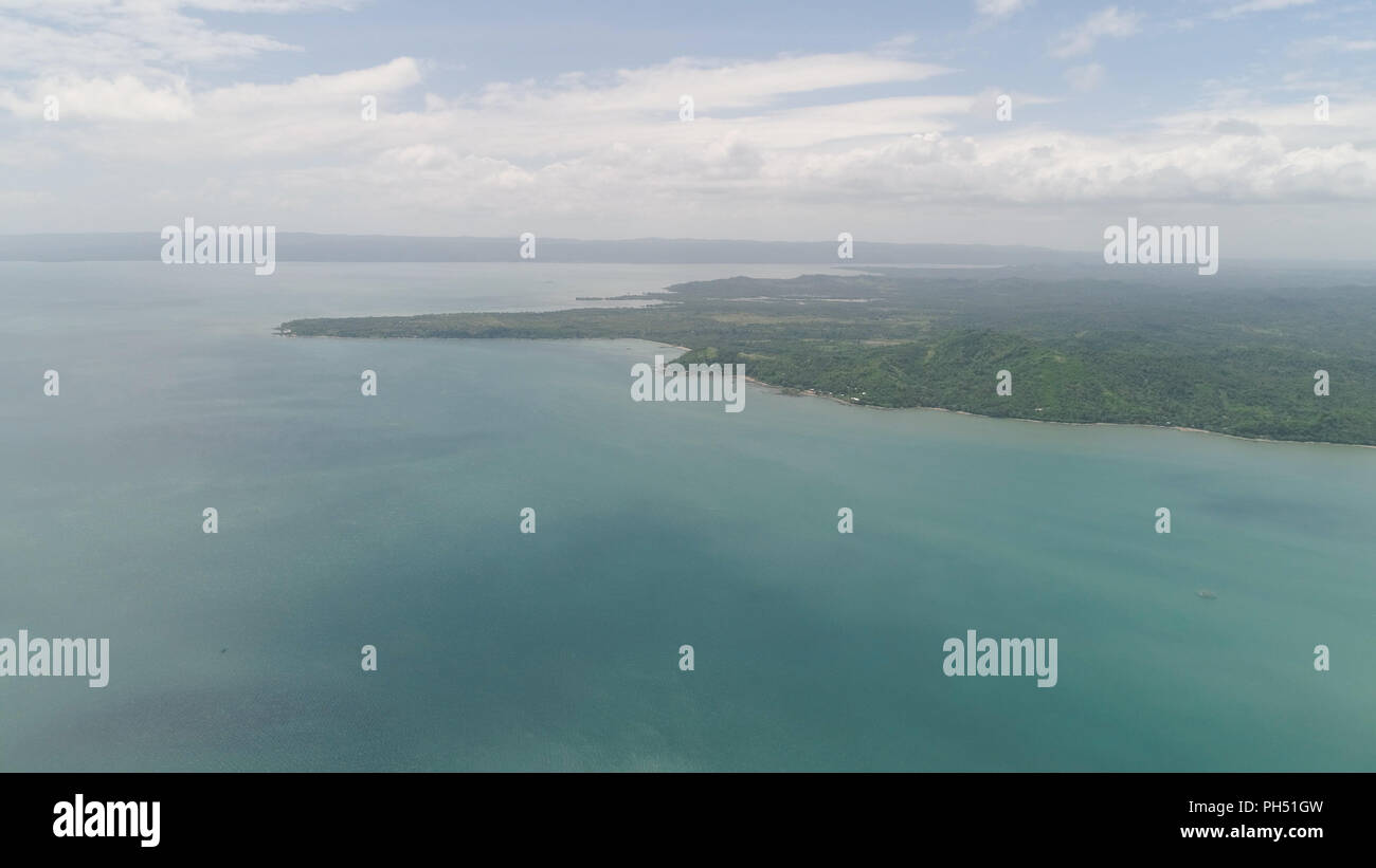 Aerial view of seashore with beach, lagoons and coral reefs ...