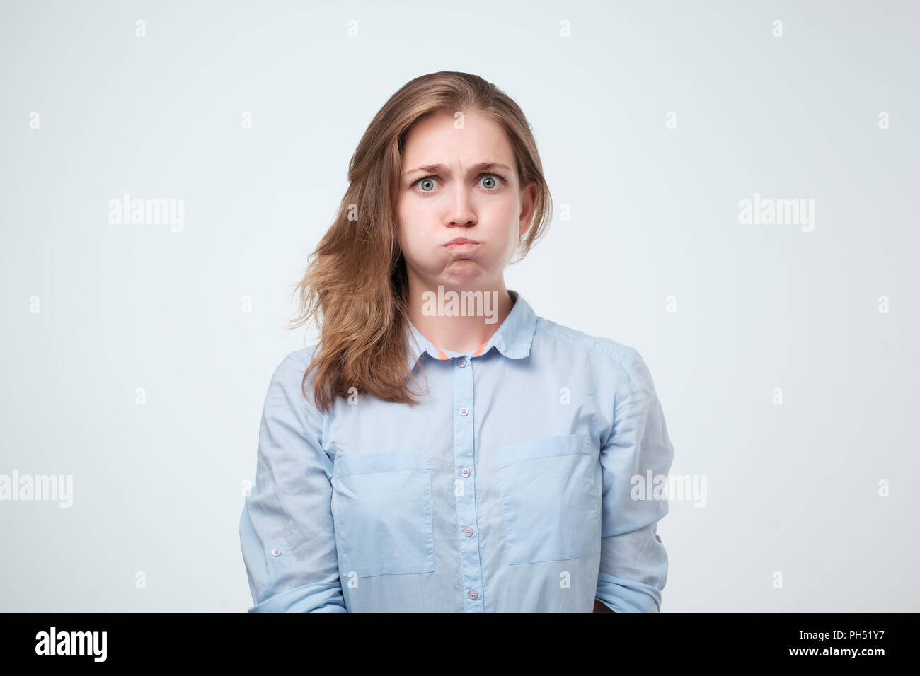 Inflate one cheek hi-res stock photography and images - Alamy