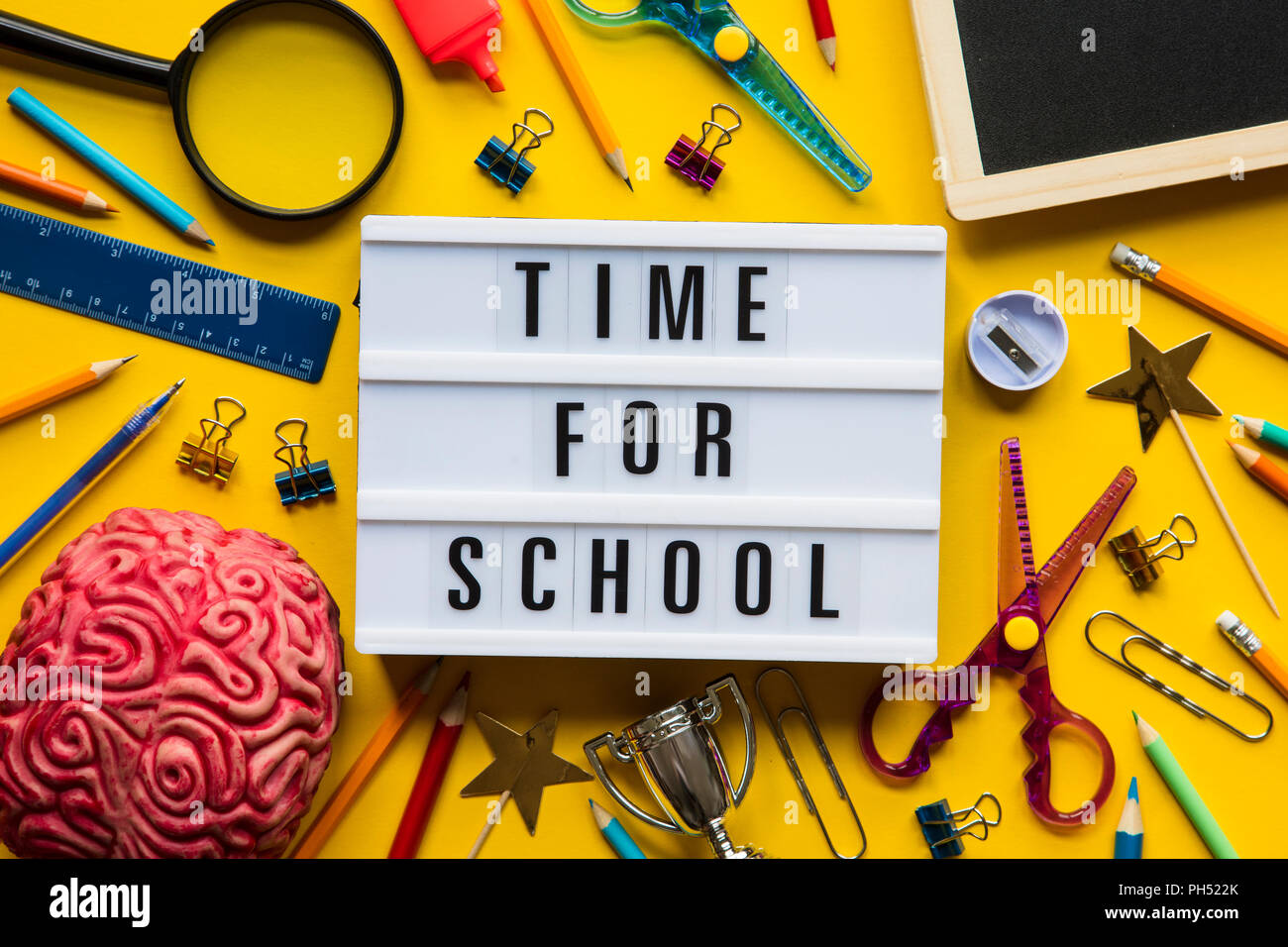 time for school lightbox message on a bright yellow background Stock ...