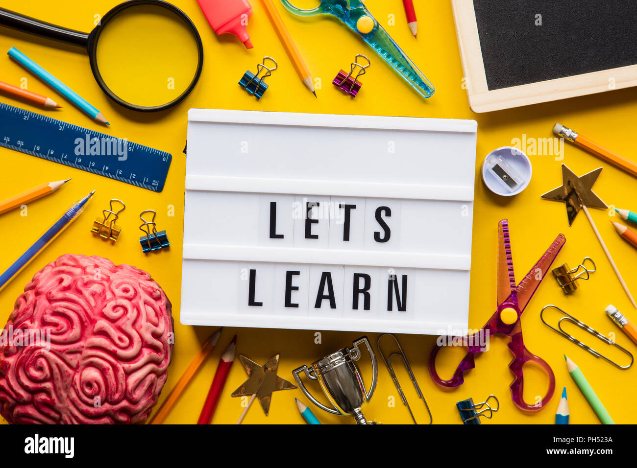 Lets learn lightbox message on a bright yellow background Stock Photo ...