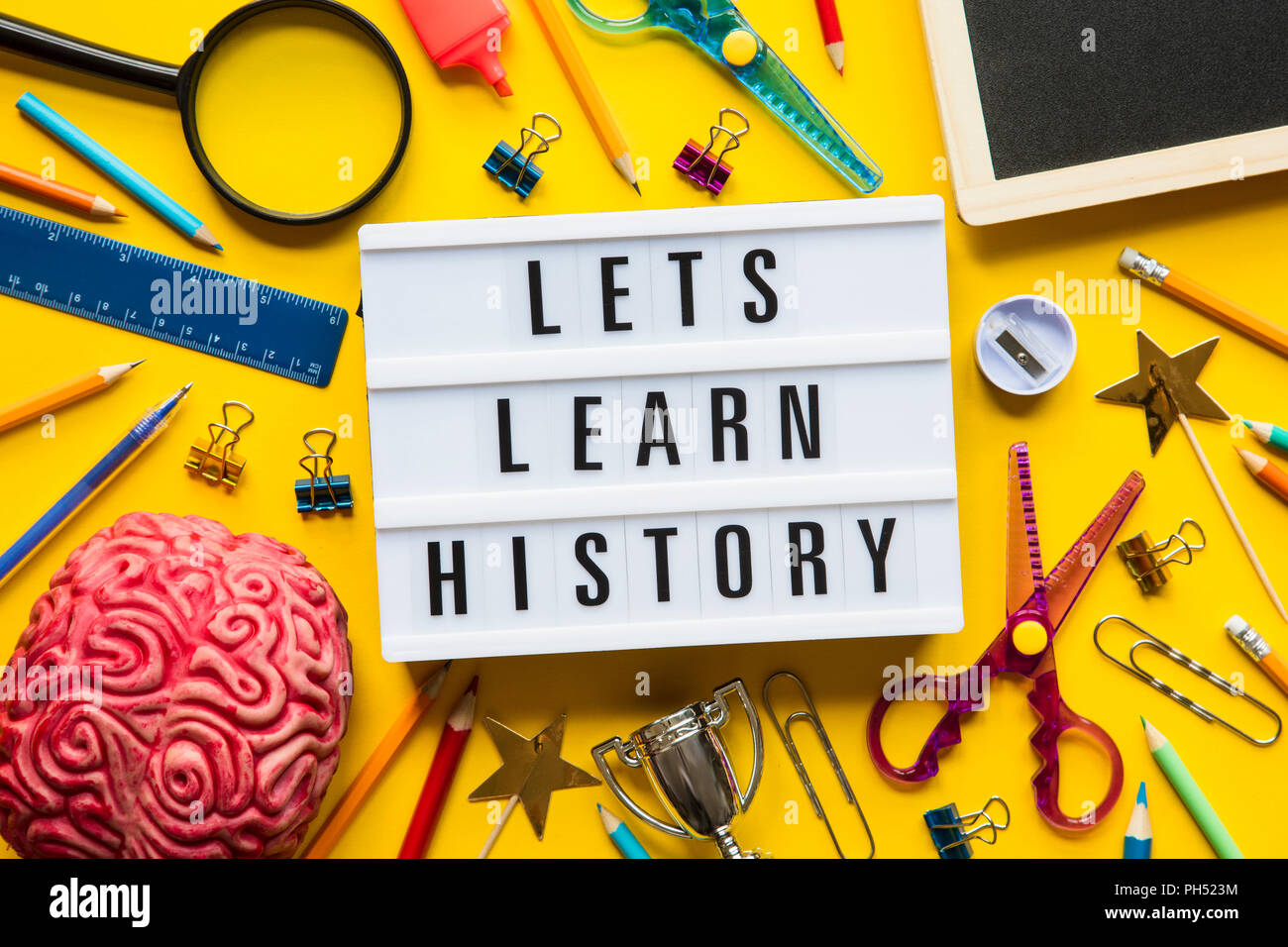 Lets learn history lightbox message on a bright yellow background Stock ...