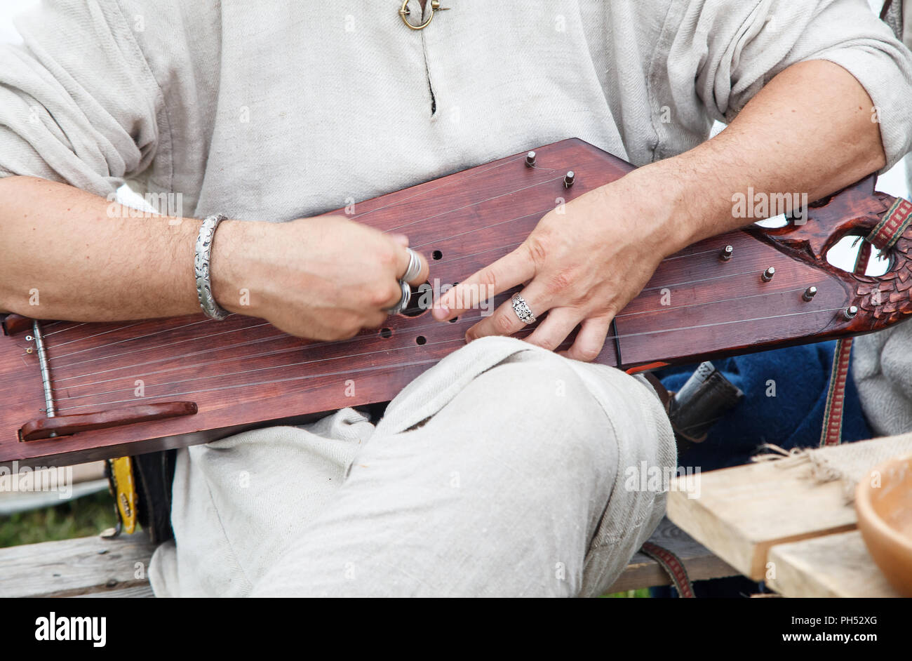 Man playing lyre hi-res stock photography and images - Alamy