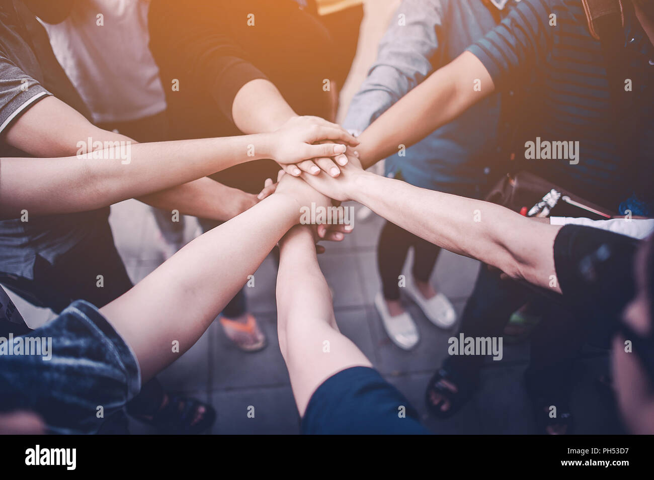 teamwork With our arms and hands Stock Photo - Alamy
