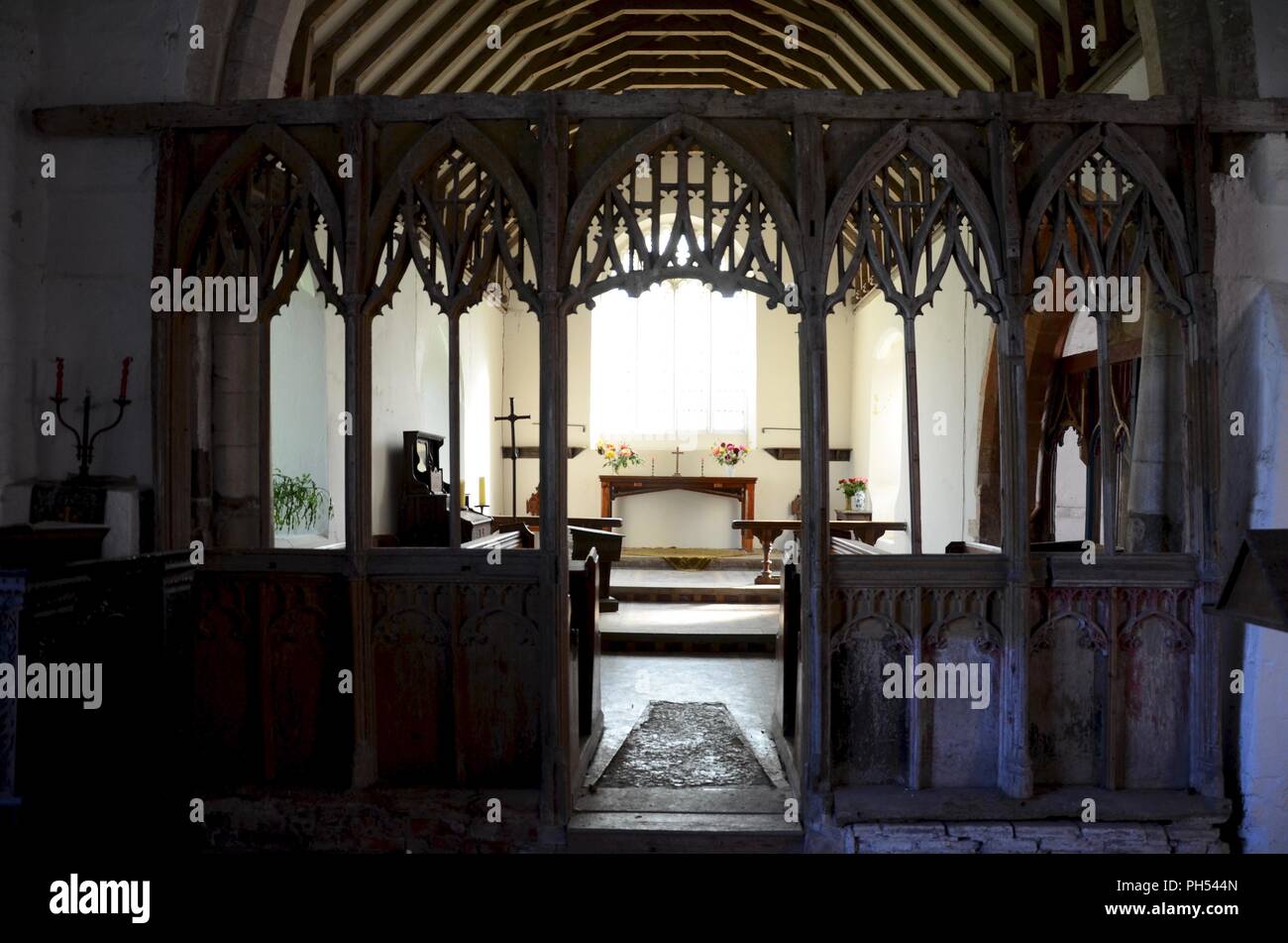 Wooden reredos inside All Saints' Church, Saltfleetby, Lincolnshire,UK ...