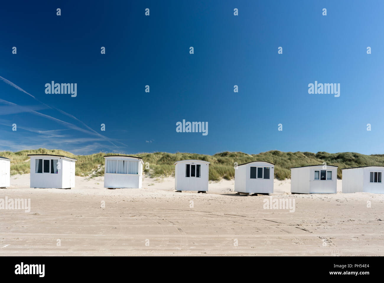 White beach huts at Løkken/ Lokken/ Loekken Beach, Denmark, in front of ...