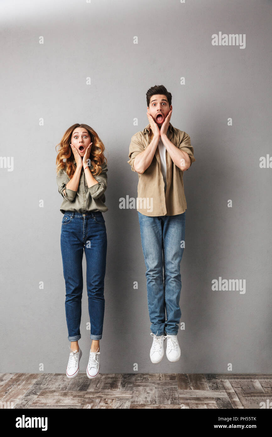 Couple jump hand hi-res stock photography and images - Alamy
