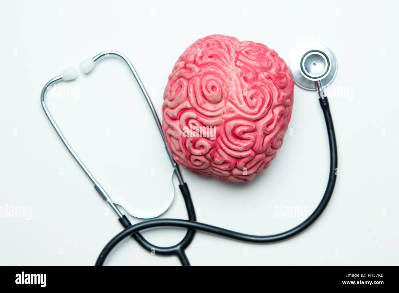 Mental health concept. Brain with a stethoscope Stock Photo - Alamy