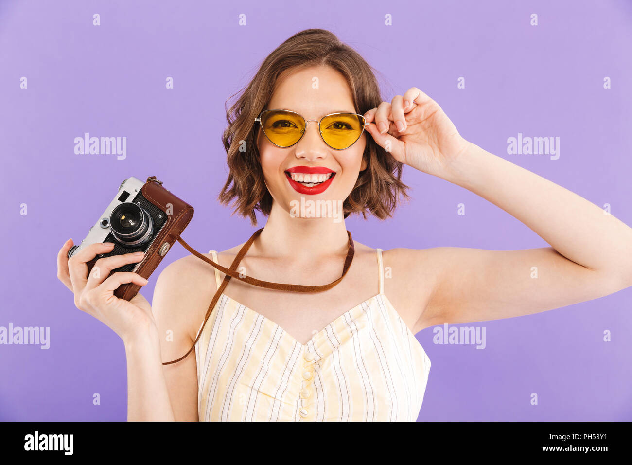 Image of amazing emotional woman photographer posing isolated over ...